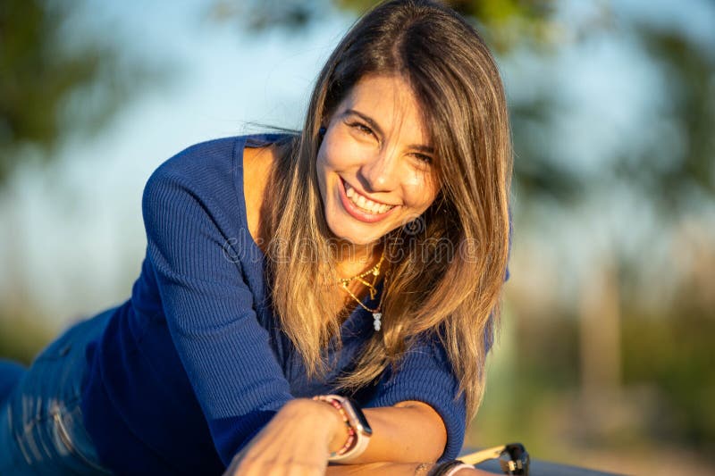Happy Woman Smiling while Enjoying the Outdoors Stock Image - Image of ...