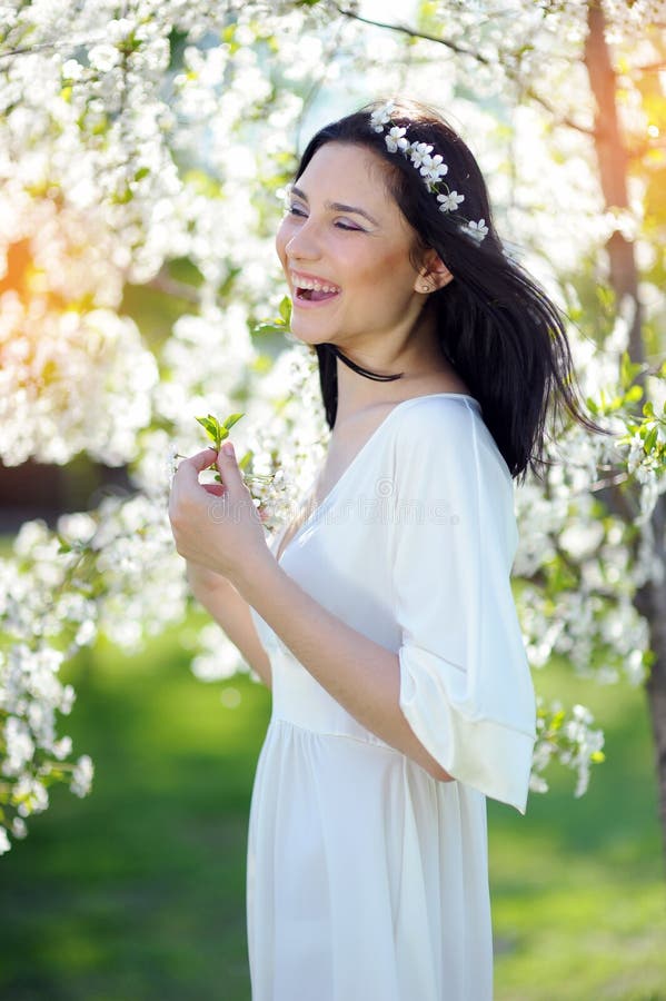 Happy Woman in a Spring Flowering Garden Stock Photo - Image of long ...