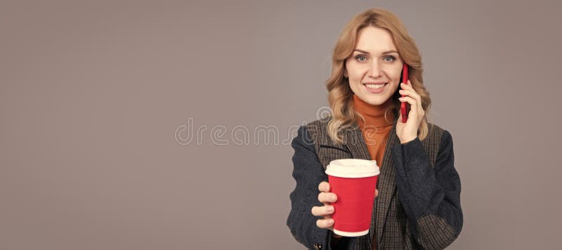 Happy Woman Talk On Mobile Phone Giving Hot Cup Grey Background Tea