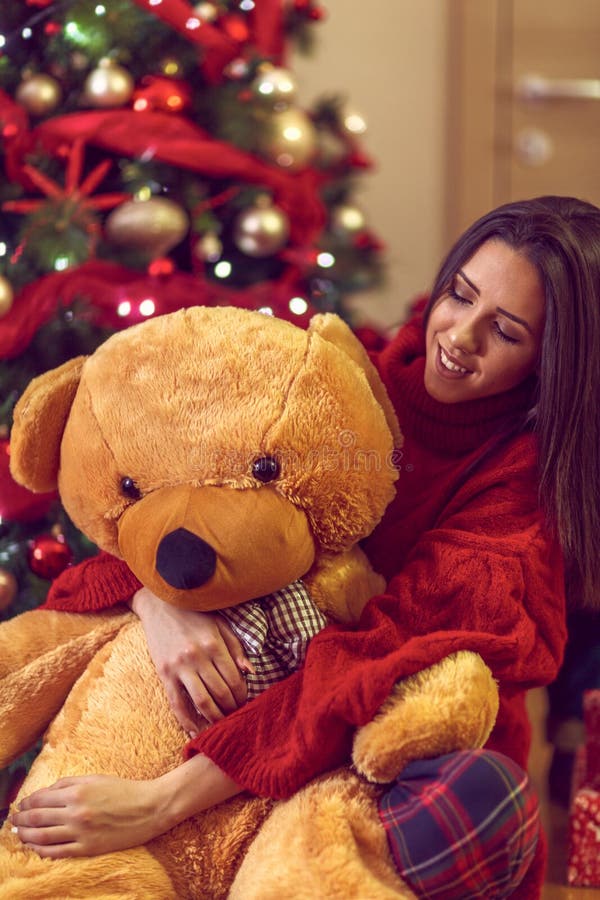 Woman with her teddy bear stock photo. Image of hold - 21869660