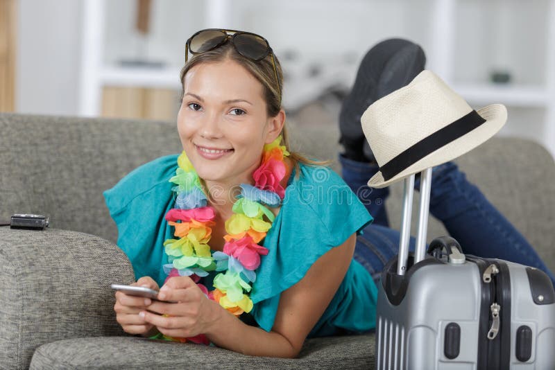 Happy Woman Texting on Smart Phone on Sofa Stock Photo - Image of shop ...