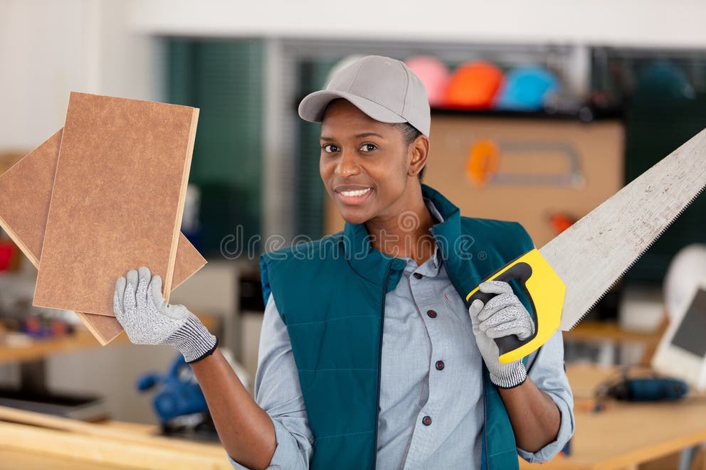 Happy woman using hand saw stock image. Image of feminism - 283608363