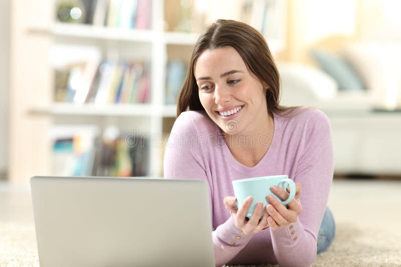 Happy Woman Using Laptop Drinking Tea at Home Stock Image - Image of ...
