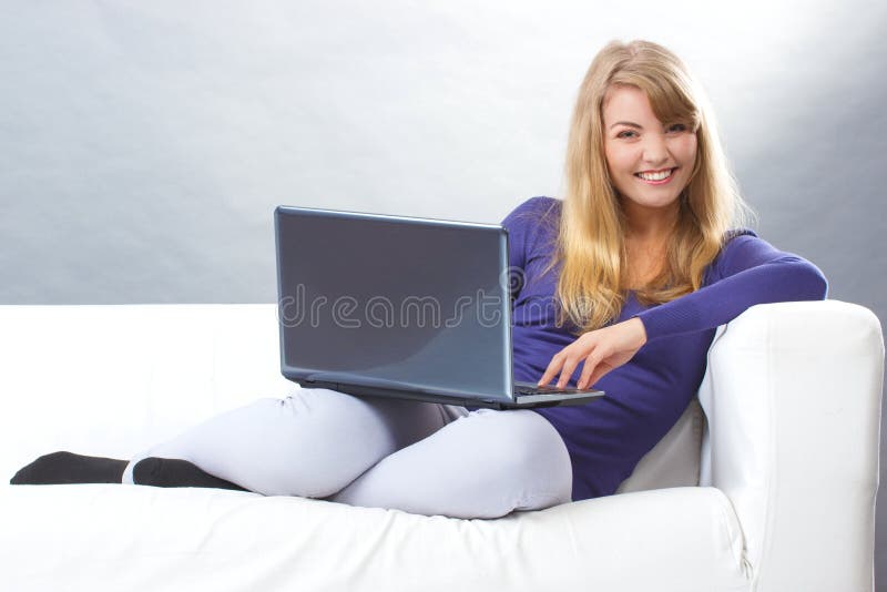 Happy Woman Using Laptop Sitting on Sofa, Modern Technology Stock Photo ...