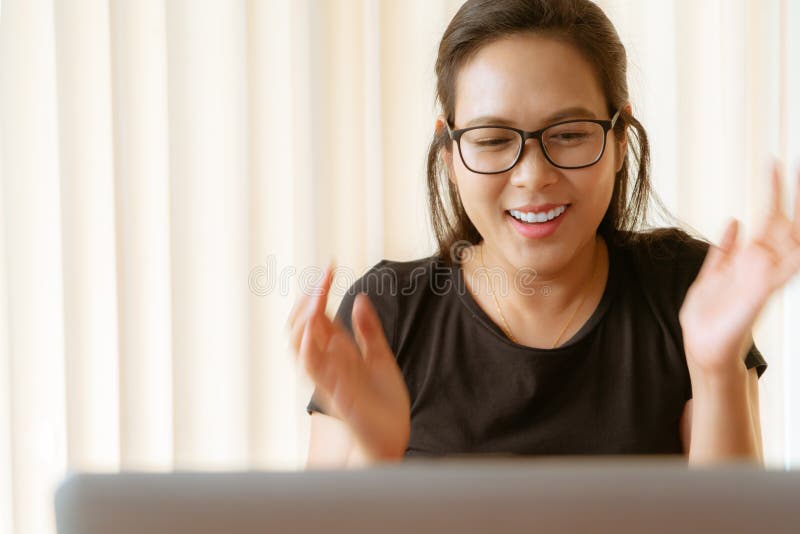 Happy Woman Using Laptop. Young Asian Woman Sitting at Home and Working ...