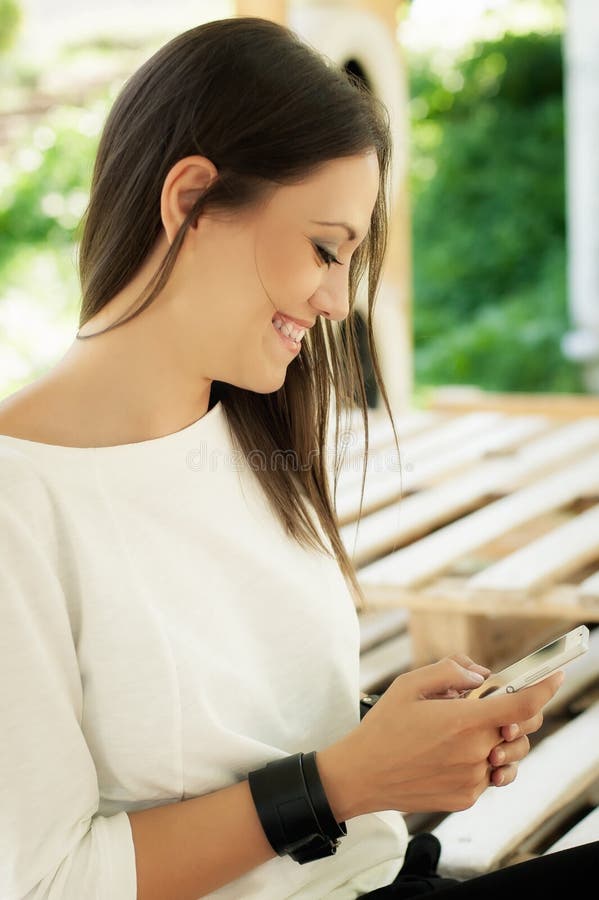 Happy Woman Using Mobile Phone Stock Image - Image of excited, mobile ...