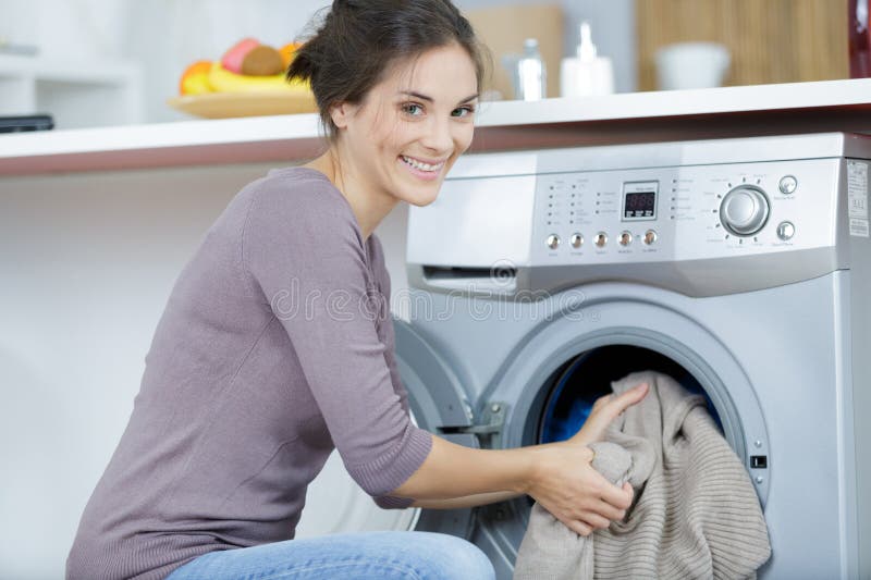 Happy Woman Using Washing Machine at Home Stock Photo - Image of washer ...