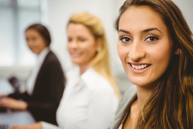 Happy Women in Computer Room Smiling at Camera Stock Image - Image of ...