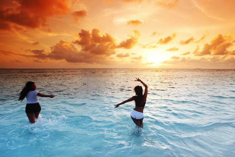 Happy Women Playing in Water Stock Photo - Image of concept, outdoors ...