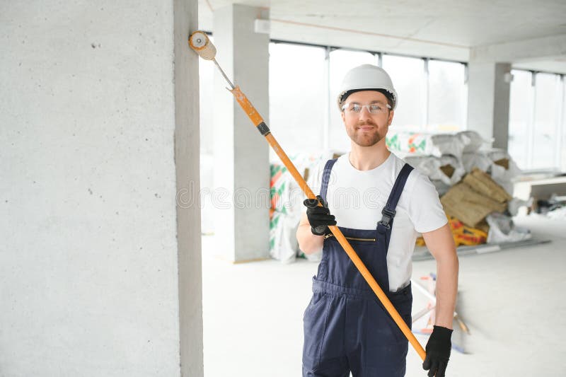 A Happy Worker Proudly Standing at His Workplace. Stock Photo - Image ...
