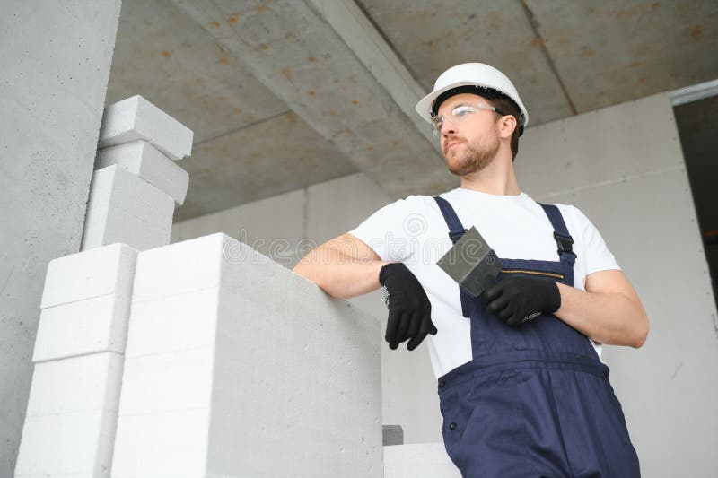 A Happy Worker Proudly Standing at His Workplace. Stock Photo - Image ...
