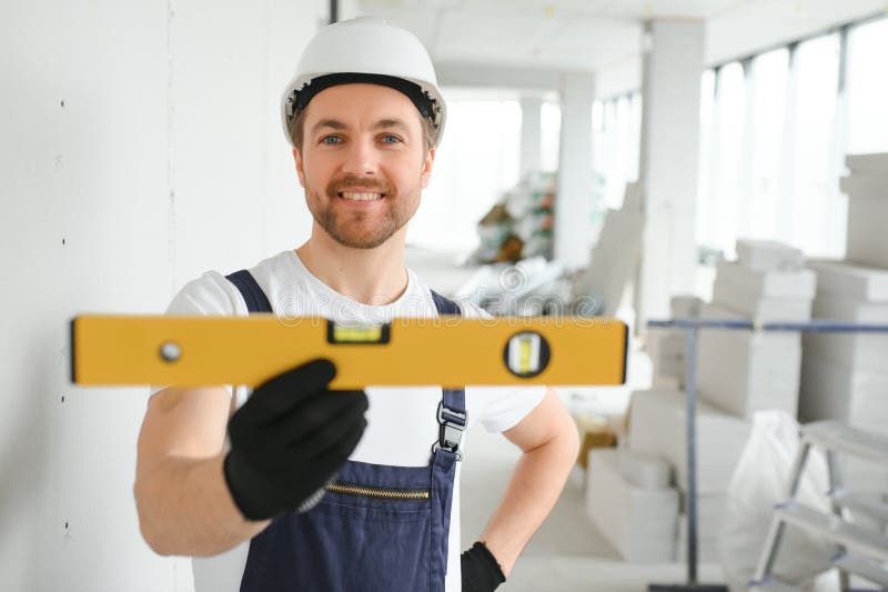 A Happy Worker Proudly Standing at His Workplace. Stock Photo - Image ...