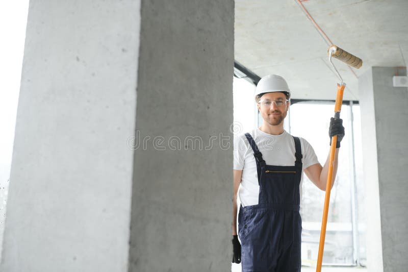 A Happy Worker Proudly Standing at His Workplace. Stock Photo - Image ...