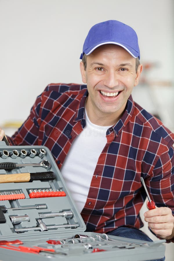 Happy Worker Showing Tool Box To Camera Stock Photo - Image of leak ...