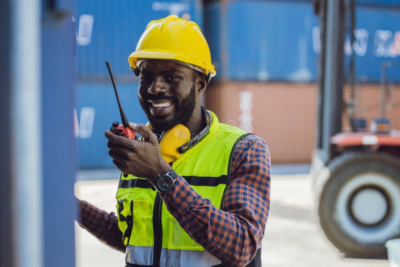 Happy Worker Working in Port Logistic Cargo Industry with Radio Command ...