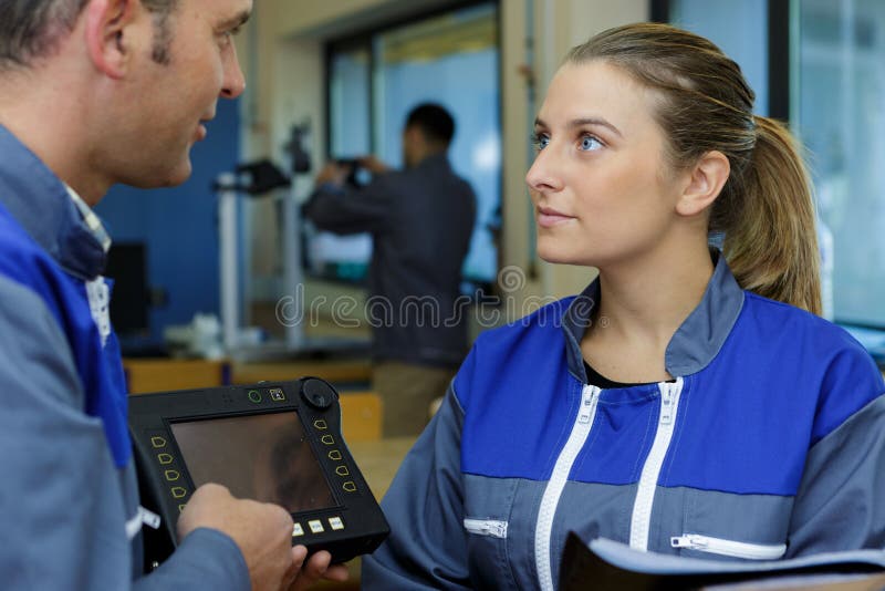 Happy Workers in Auto Repair Shop Stock Photo - Image of auto, pretty ...