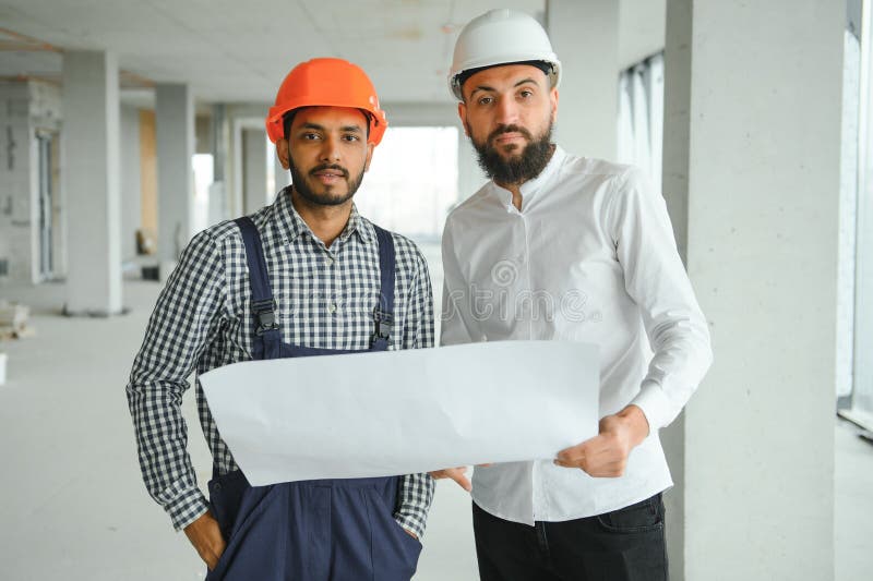 Happy Workers at Construction Site, Young Civil Engineer Manager and ...
