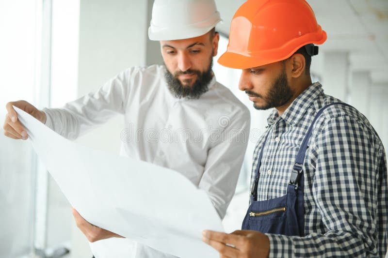Happy Workers at Construction Site, Young Civil Engineer Manager and ...