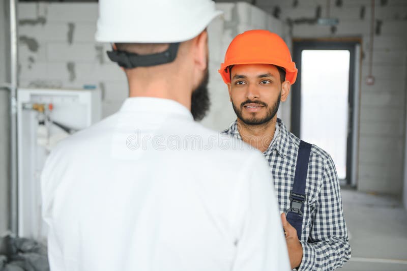 Happy Workers at Construction Site, Young Civil Engineer Manager and ...