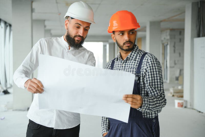 Happy Workers at Construction Site, Young Civil Engineer Manager and ...