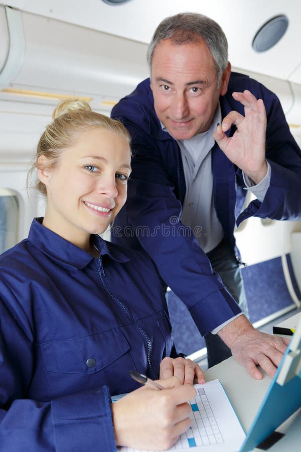 Happy Workers on Final Assembly Line Aircraft Stock Image - Image of ...