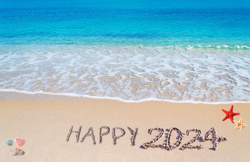 Happy 2024 Written on the Sand Stock Photo - Image of written, sunlight ...