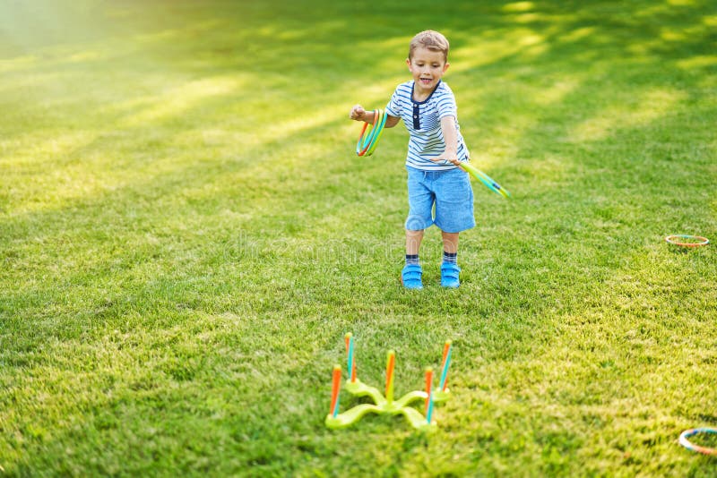Happy 3 Year Old Boy Having Fun Playing Outside Stock Photo - Image of ...