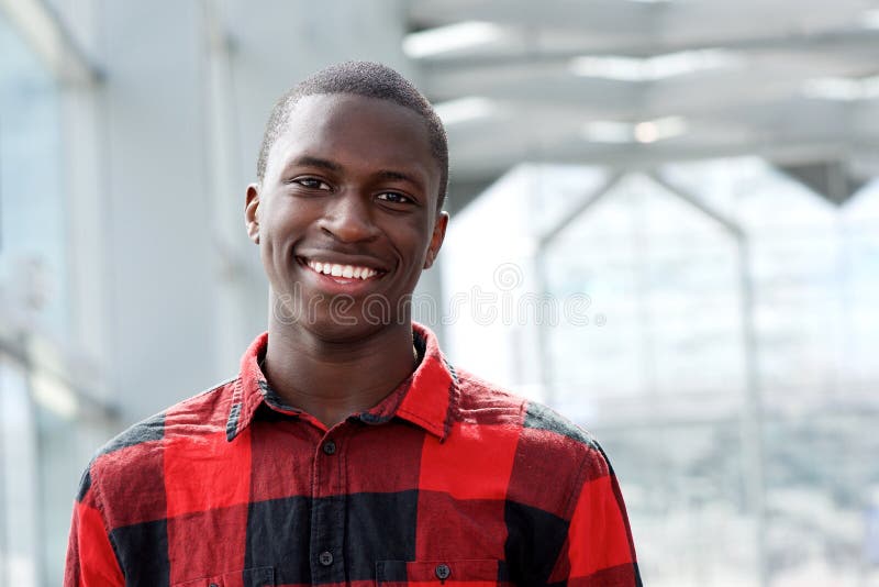Happy Young African Man Standing Outside Stock Image - Image of person ...