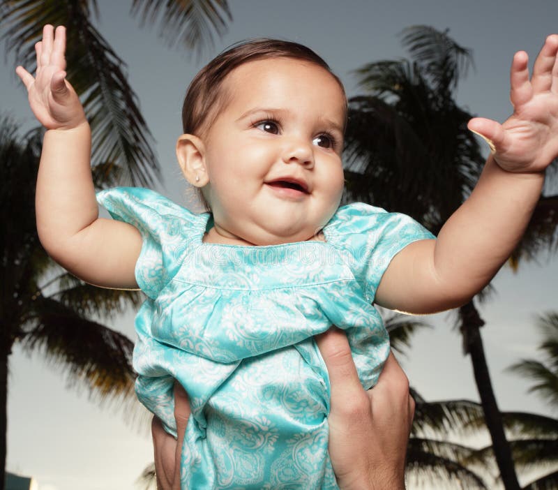 Happy young baby stock photo. Image of girl, baby, midair - 9502862