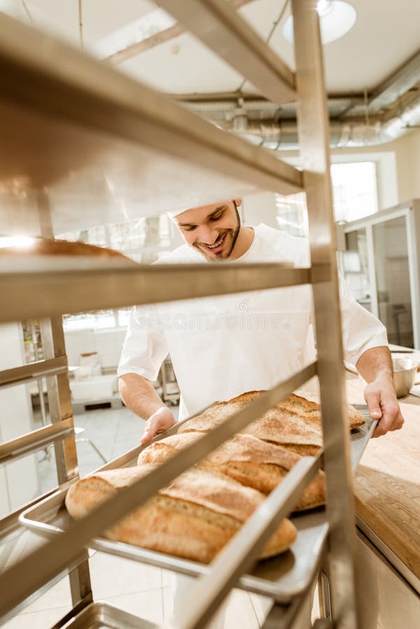 Closeup Perfect Look of Young Woman Baker in a Bakery she Smelling ...