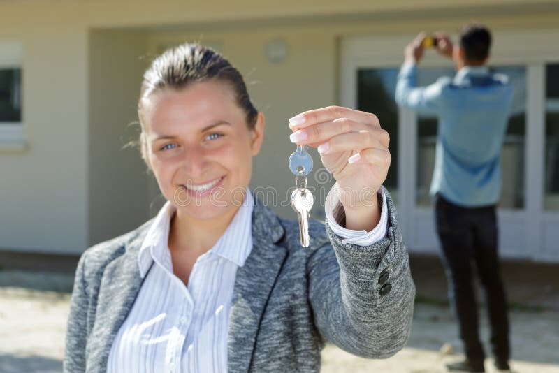 Happy Young Beautiful Woman Holding Keys Stock Photo - Image of money ...