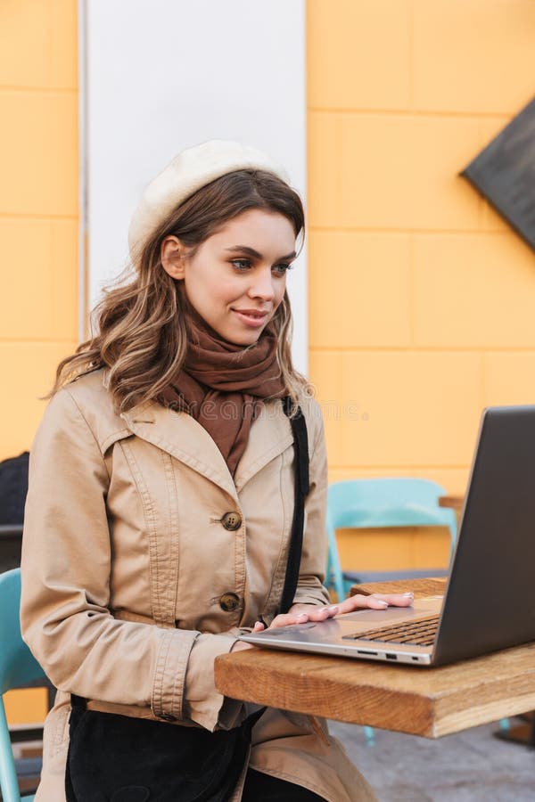 Happy Young Beautiful Woman Walking Outdoors Using Laptop Computer ...