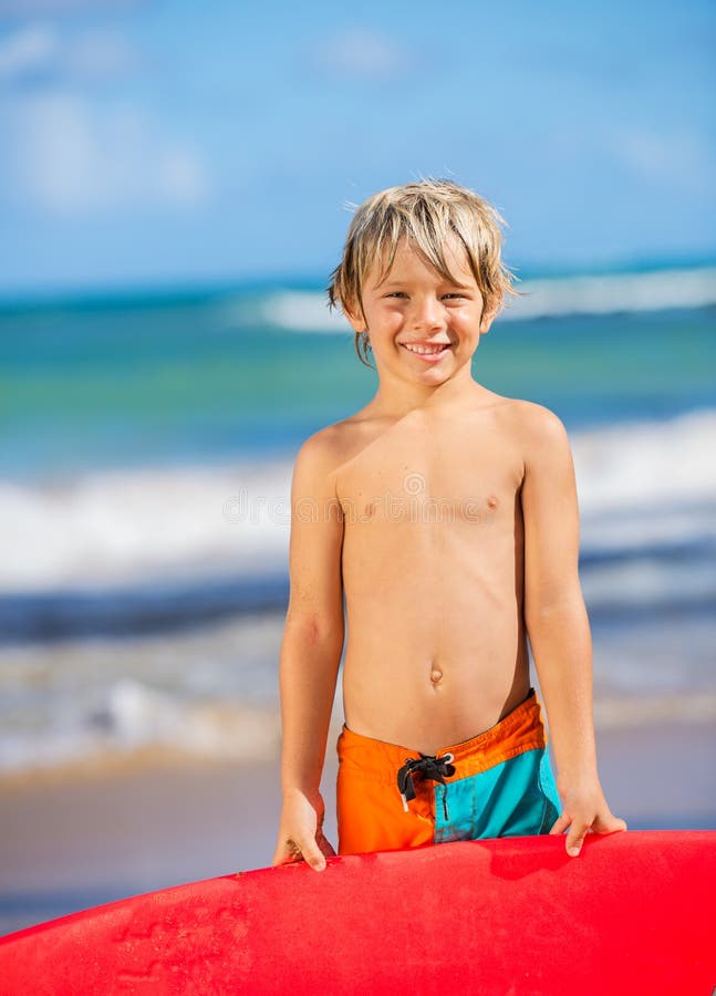 Happy Young Kids Playing at the Beach on Summer Vacation Stock Image ...