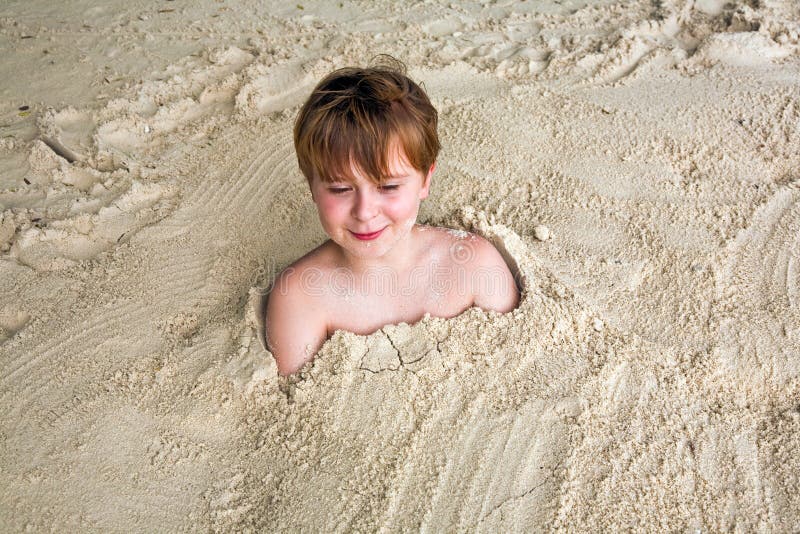 Happy Young Boy Covered by Fine Sand Stock Image - Image of beautiful ...