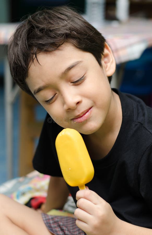294 Happy Asian Boy Eating Ice Cream Stock Photos - Free & Royalty-Free ...