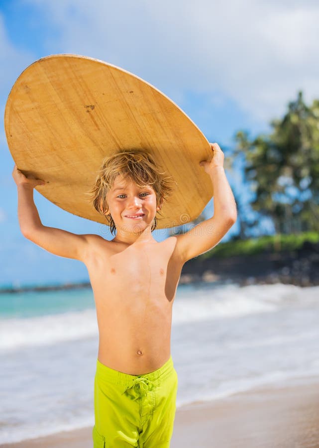 Happy Young Boy Having Fun at the Beach on Vacation, Stock Image ...