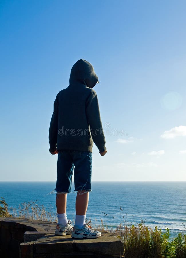 Happy, Young Boy Looking Over the Ocean Stock Image - Image of ocean ...