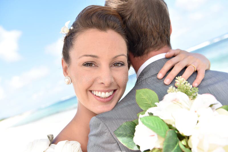 Happy Young Bride Embracing Her Husband Stock Photo - Image of marriage ...