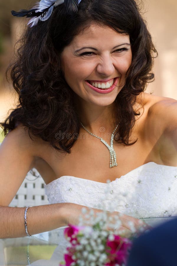 Happy young bride laughing stock photo. Image of pretty - 27319870