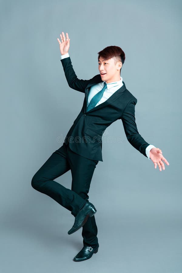 Happy Young Business Man Dancing in Motion Stock Image - Image of cute ...