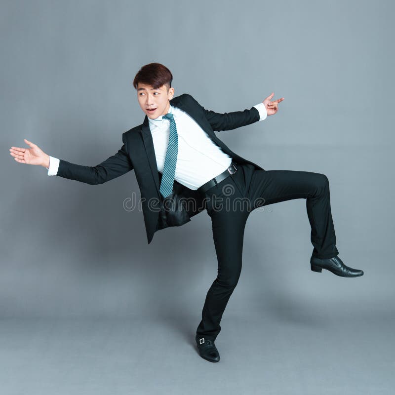 Happy Young Business Man Dancing in Motion Stock Image - Image of ...