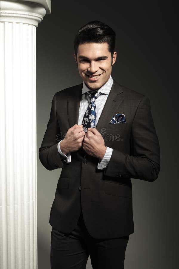 Happy Young Business Man Fixing His Collar Stock Photo - Image of male ...