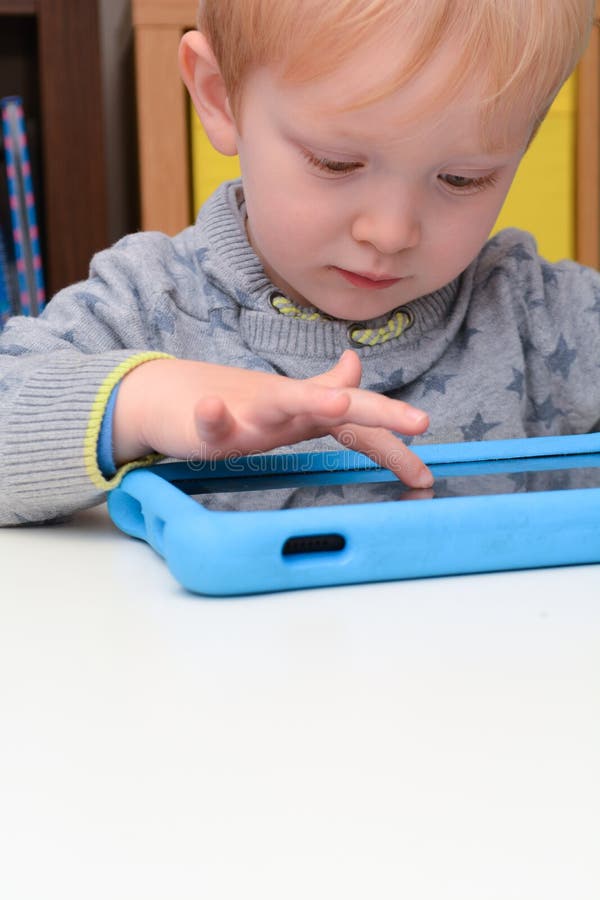 Child Using a Tablet Touch Screen Device Stock Image - Image of young ...