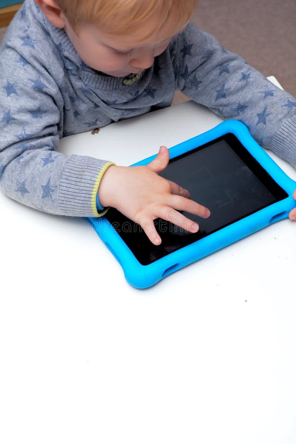 Child Using a Tablet Touch Screen Device Stock Photo - Image of tech ...