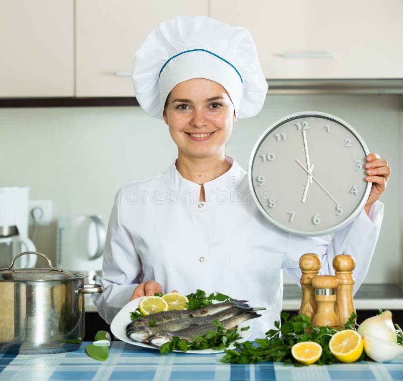 Happy Young Cook Preparing Tasty Fish for Dinner Stock Photo - Image of ...