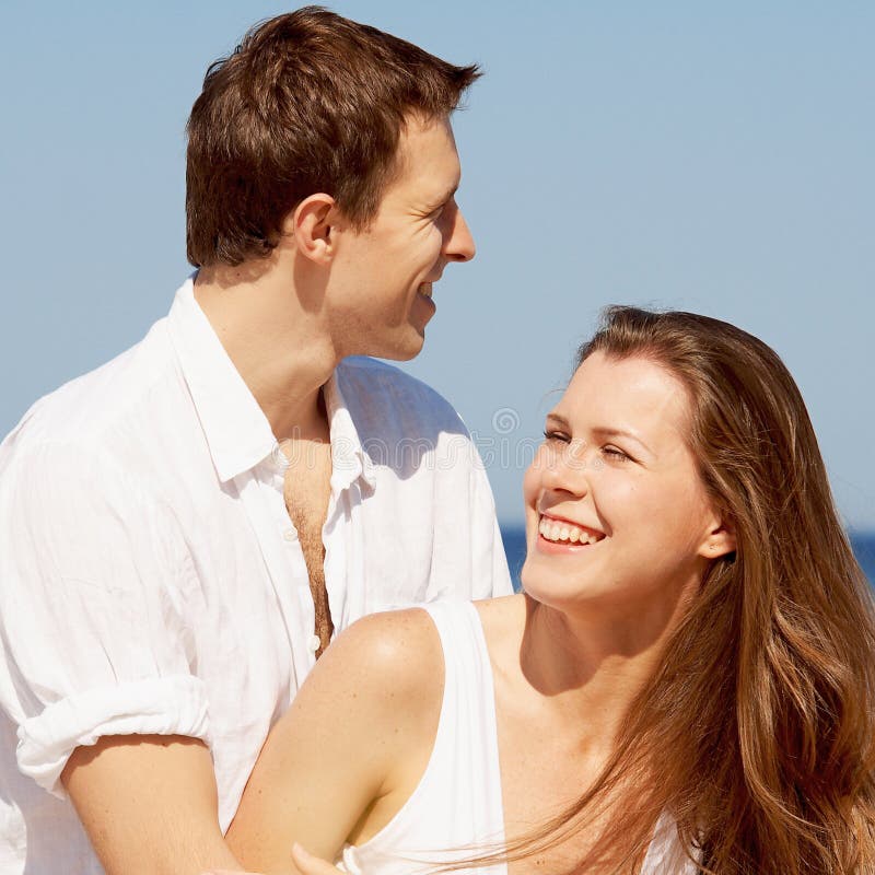 Happy young couple stock image. Image of ocean, cheerful - 10148463