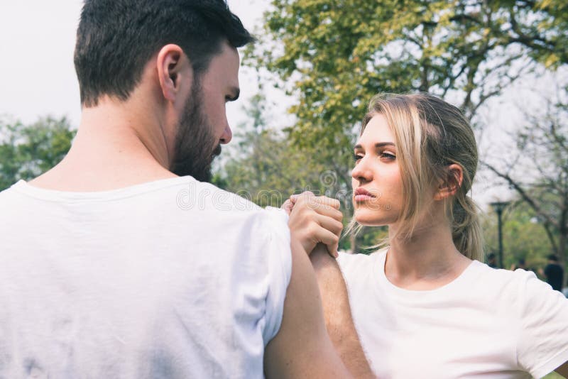 Happy Young Couple Arm Restling in the Park Stock Image - Image of ...