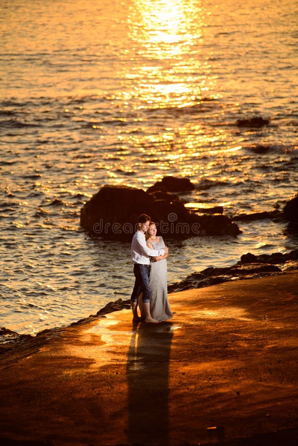 Happy Young Couple and the Bright Rays of Light Stock Photo - Image of ...