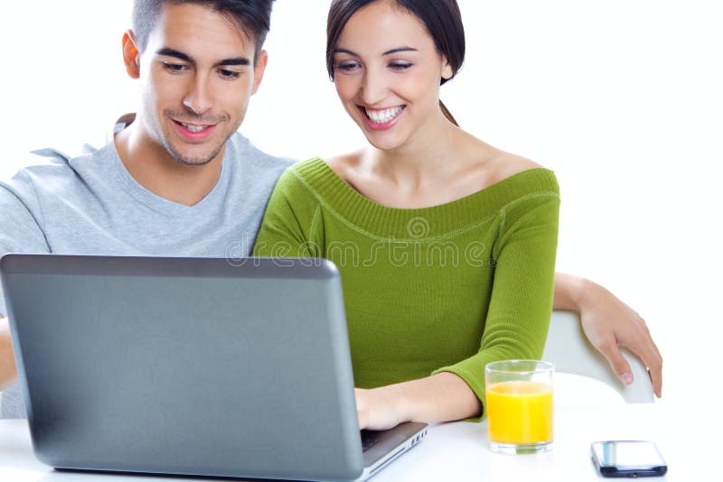 Happy Young Couple Browsing Internet at Home Stock Image - Image of ...