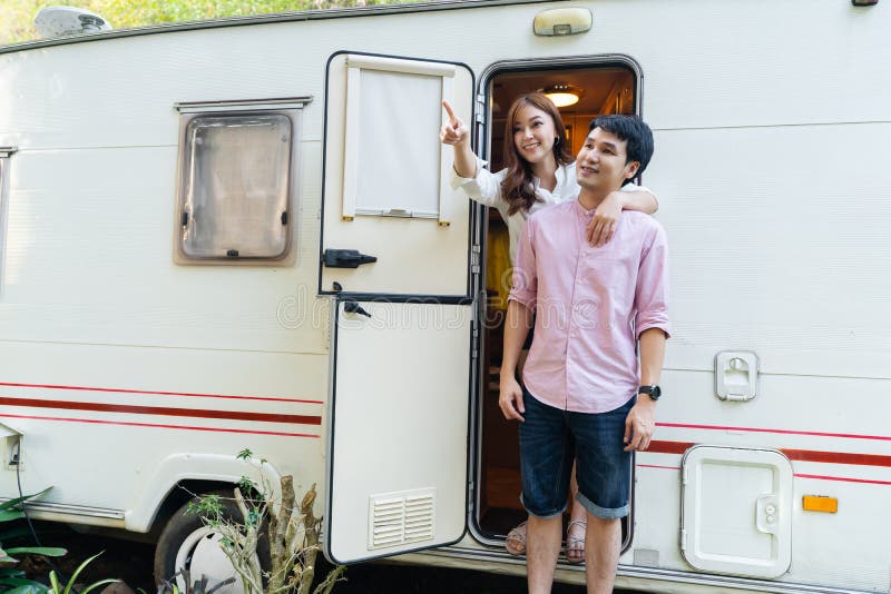 Happy Young Couple with Camper RV Van Motorhome Stock Photo - Image of ...